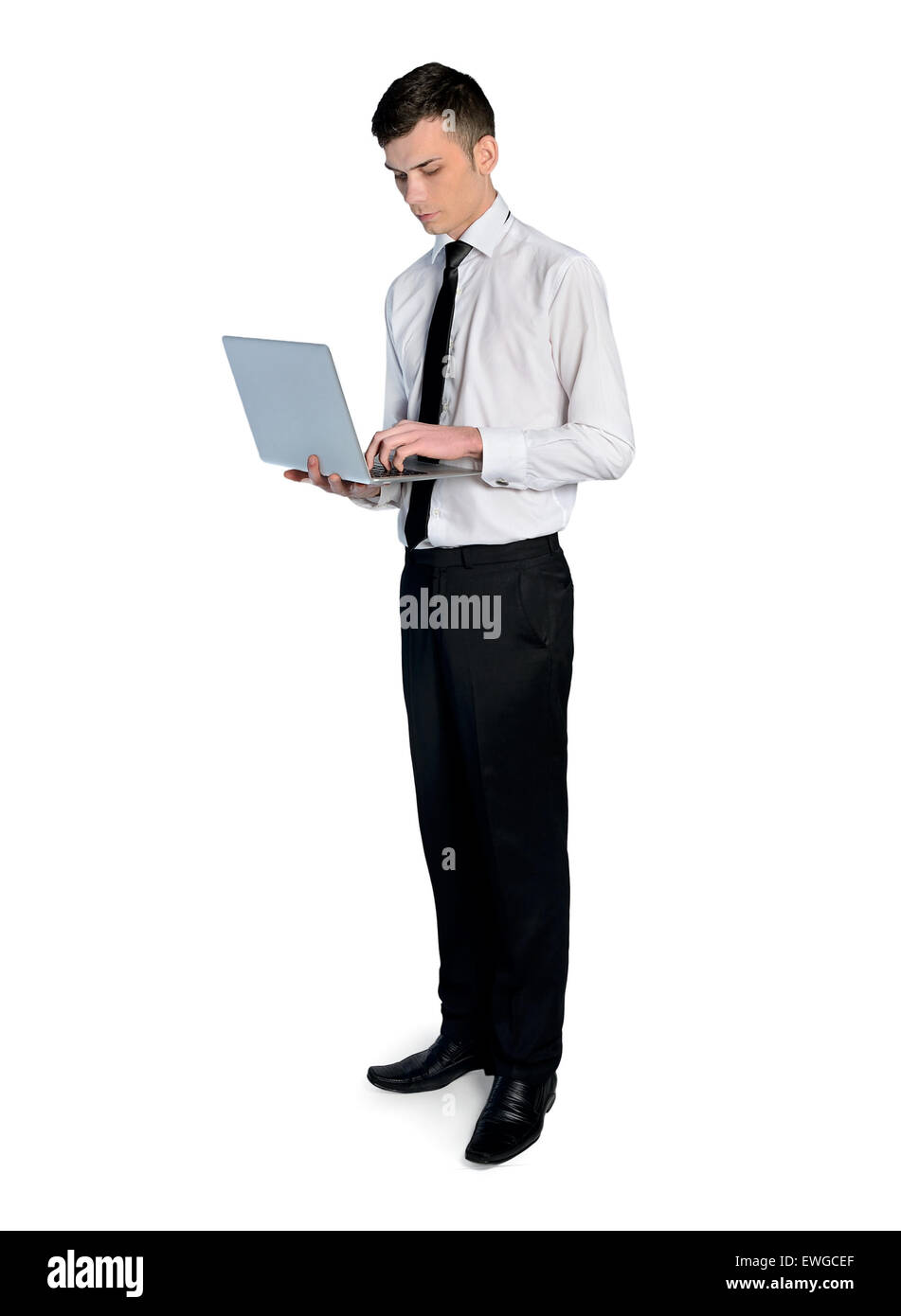 Isolated business man with laptop Stock Photo - Alamy