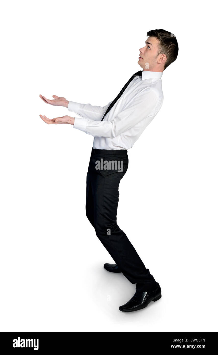 Delivery man carrying heavy Cut Out Stock Images & Pictures - Alamy