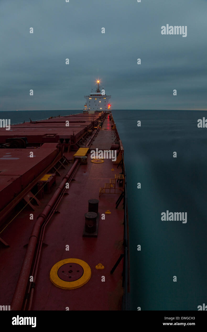 bulk laker ship underway at sunset Stock Photo - Alamy