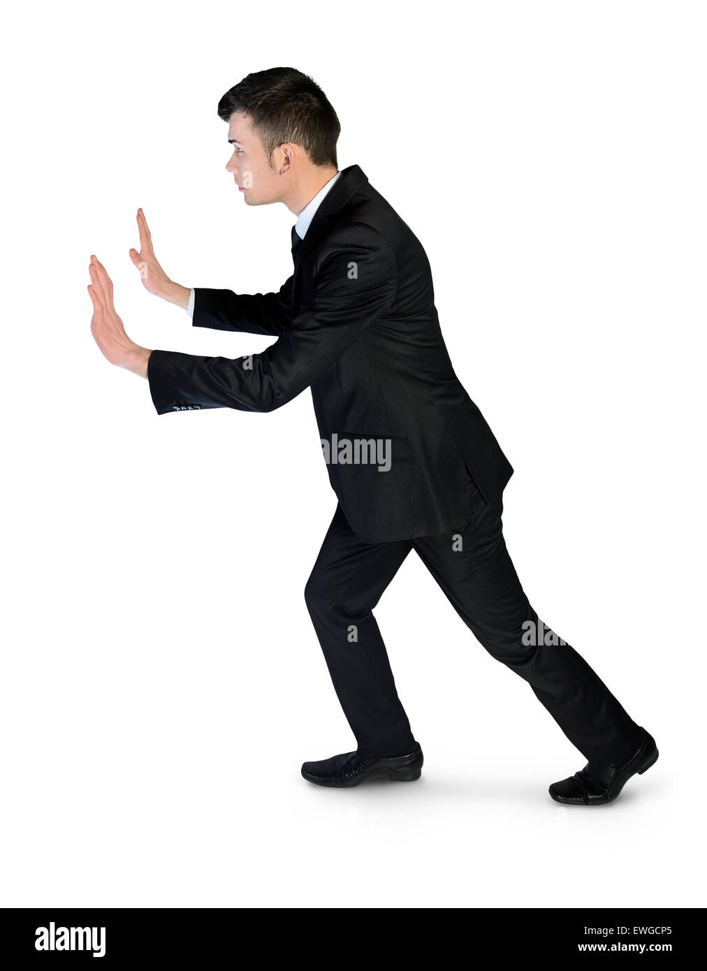 Isolated business man pushing something Stock Photo - Alamy