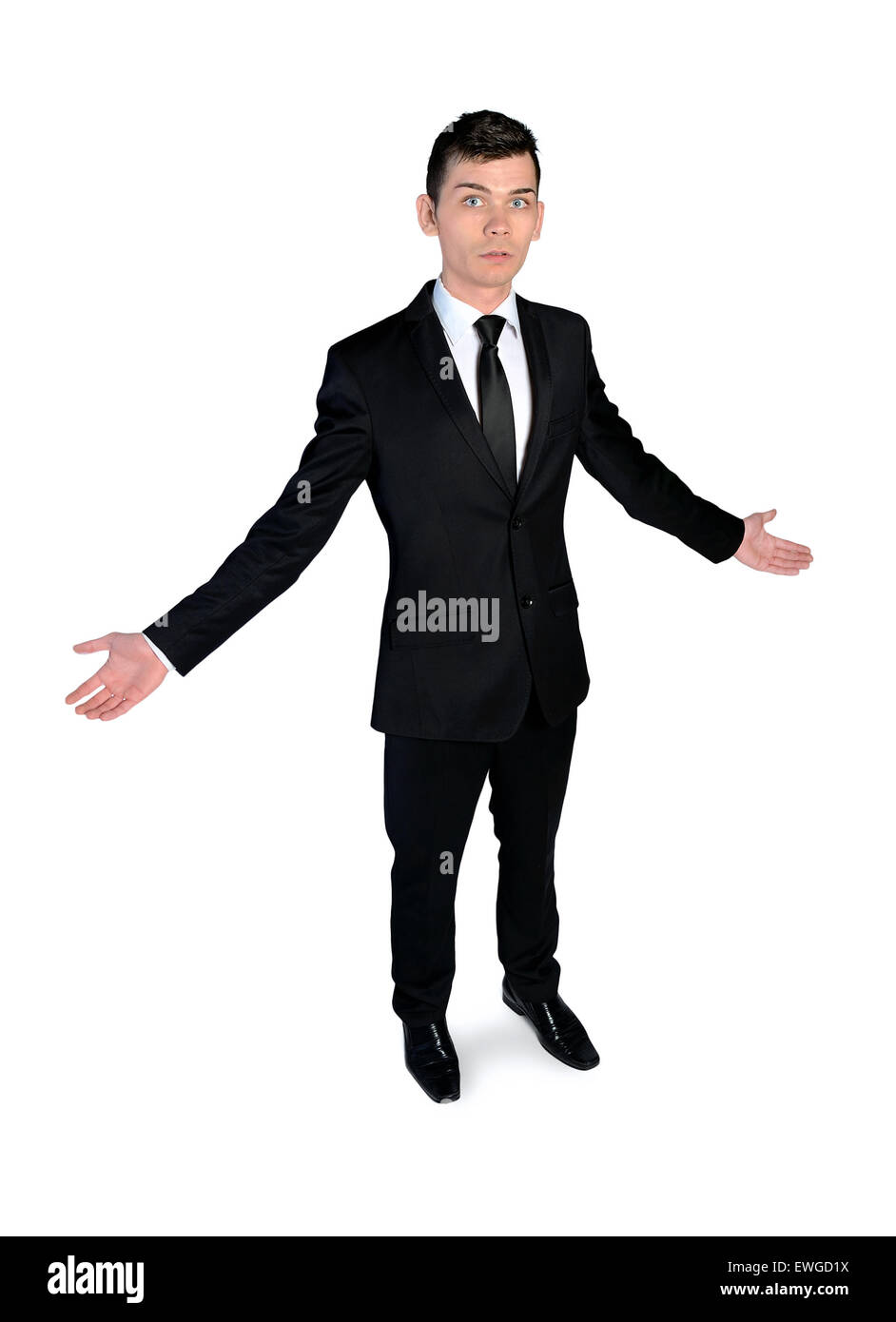 Business man confused with open arms Stock Photo - Alamy