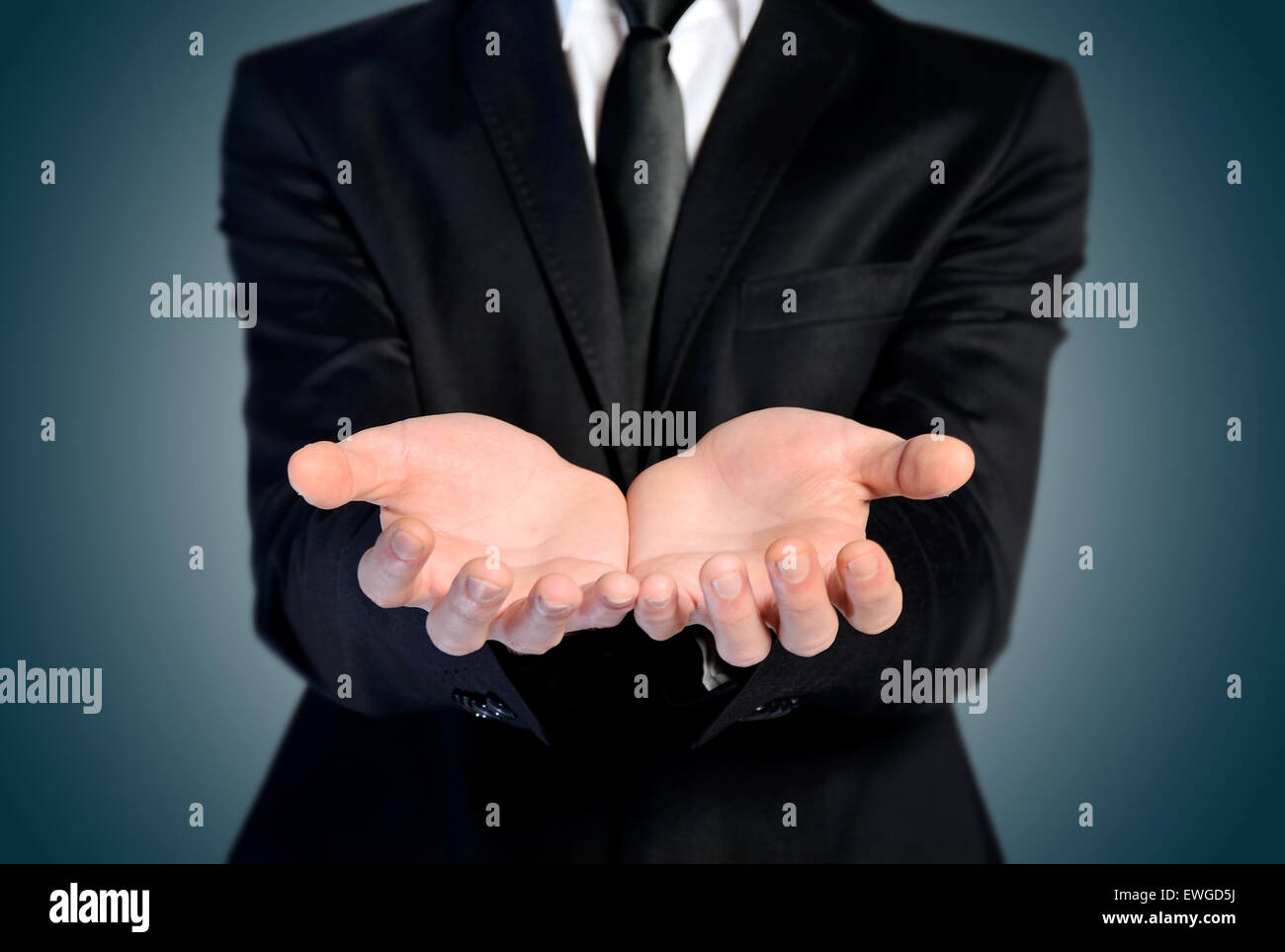Man offer hand and holding nothing Stock Photo - Alamy