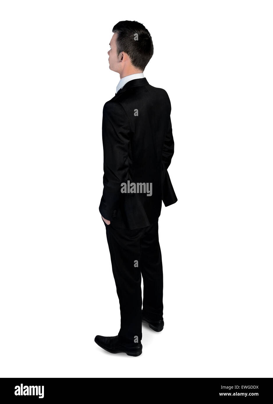 Isolated business man looking back Stock Photo - Alamy