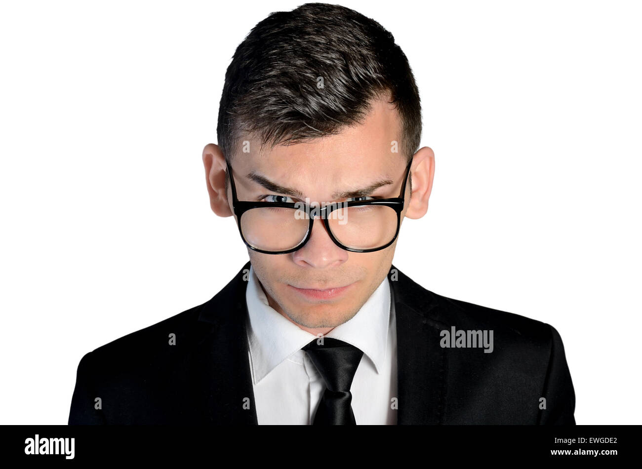 Isolated business man looking suspicious Stock Photo - Alamy