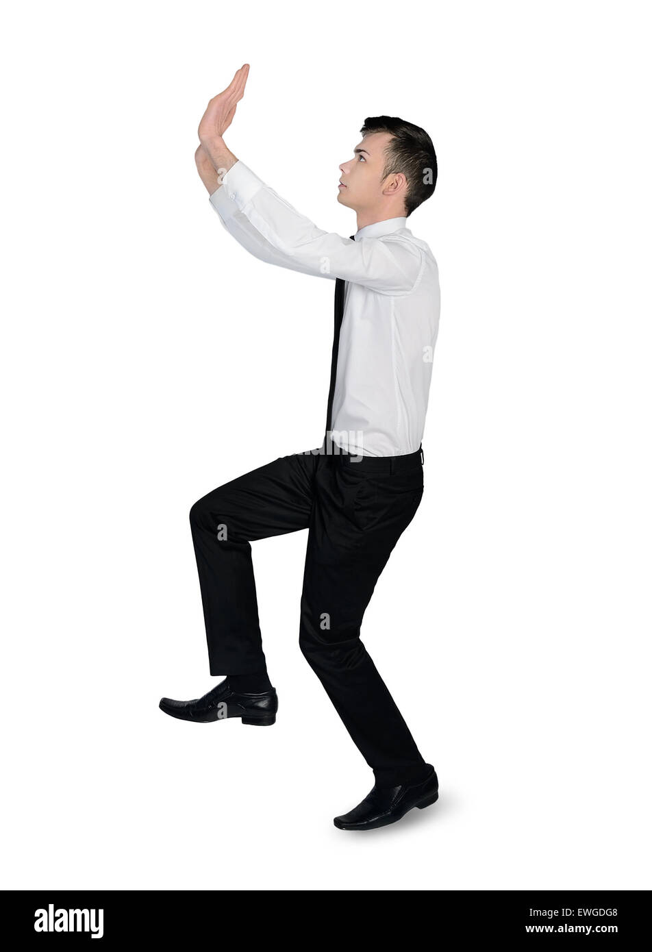 Isolated business man push something Stock Photo - Alamy