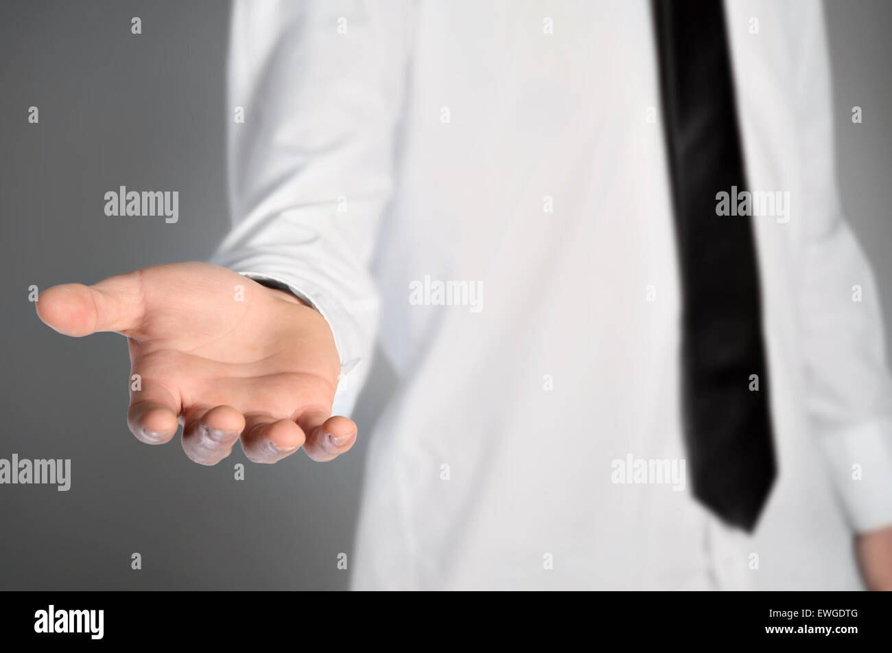 Isolated business man give hand Stock Photo - Alamy
