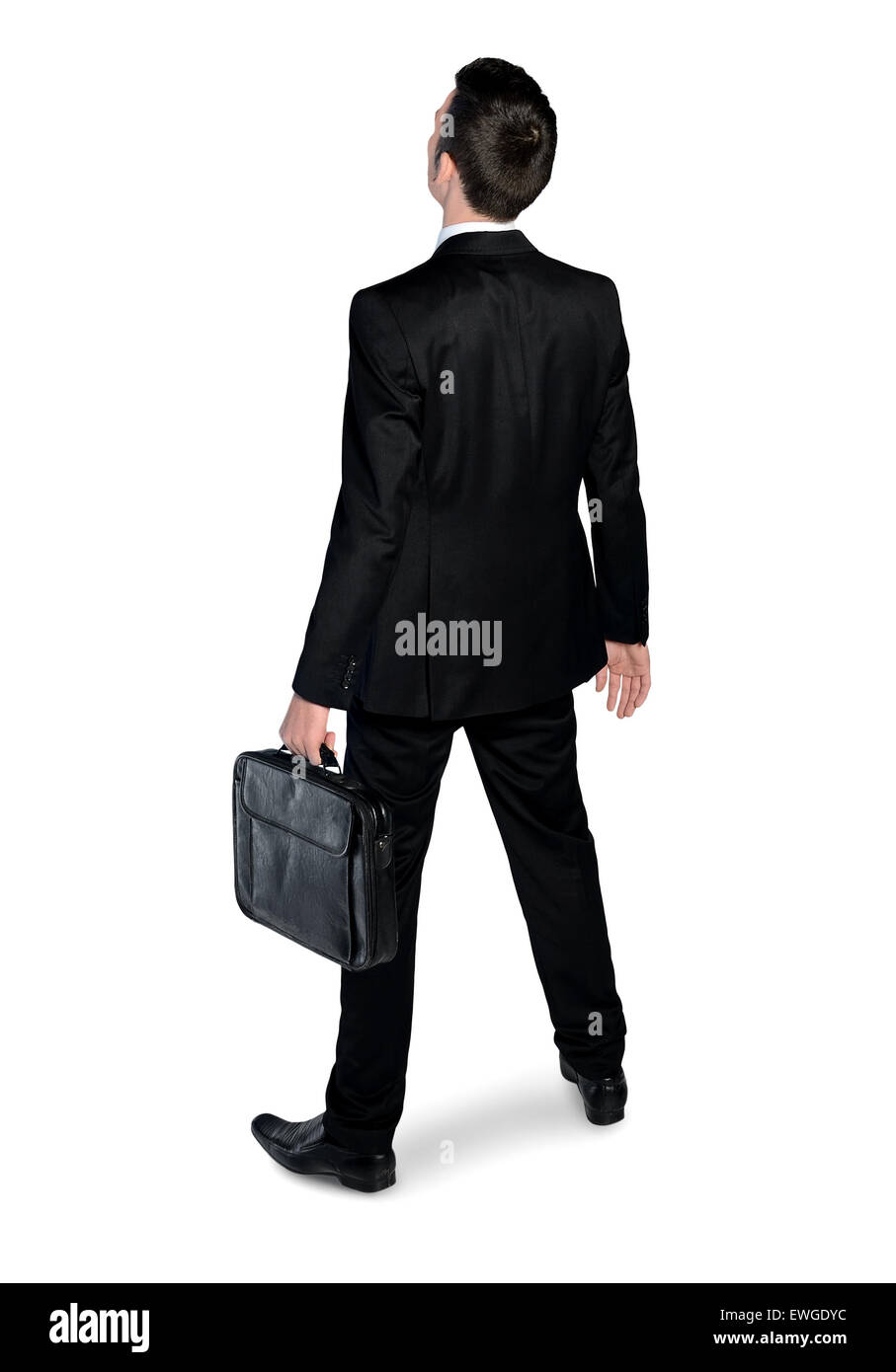 Isolated business man looking back Stock Photo - Alamy