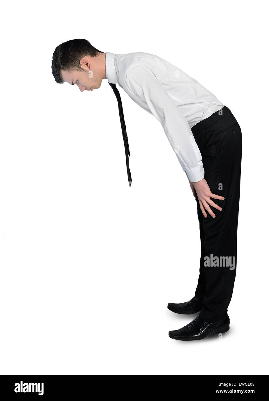 Isolated business man looking down Stock Photo - Alamy