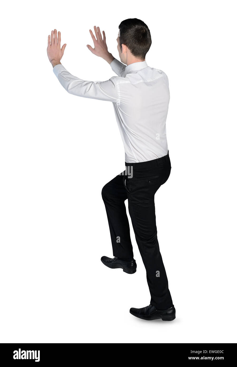 Isolated business man push something Stock Photo - Alamy