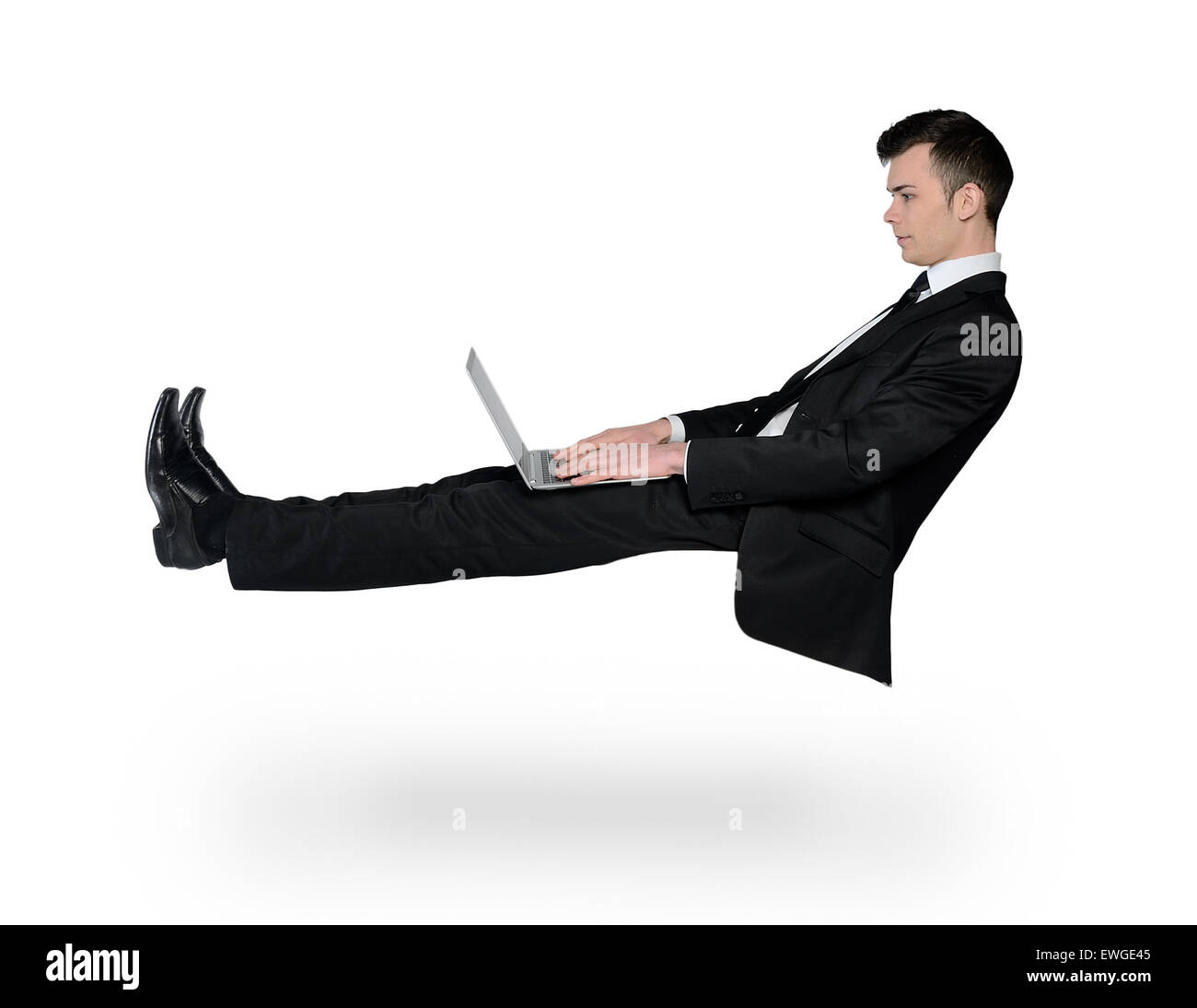 Isolated business man typing laptop Stock Photo - Alamy
