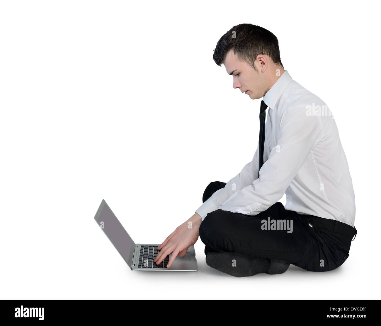 Isolated business man typing laptop Stock Photo - Alamy