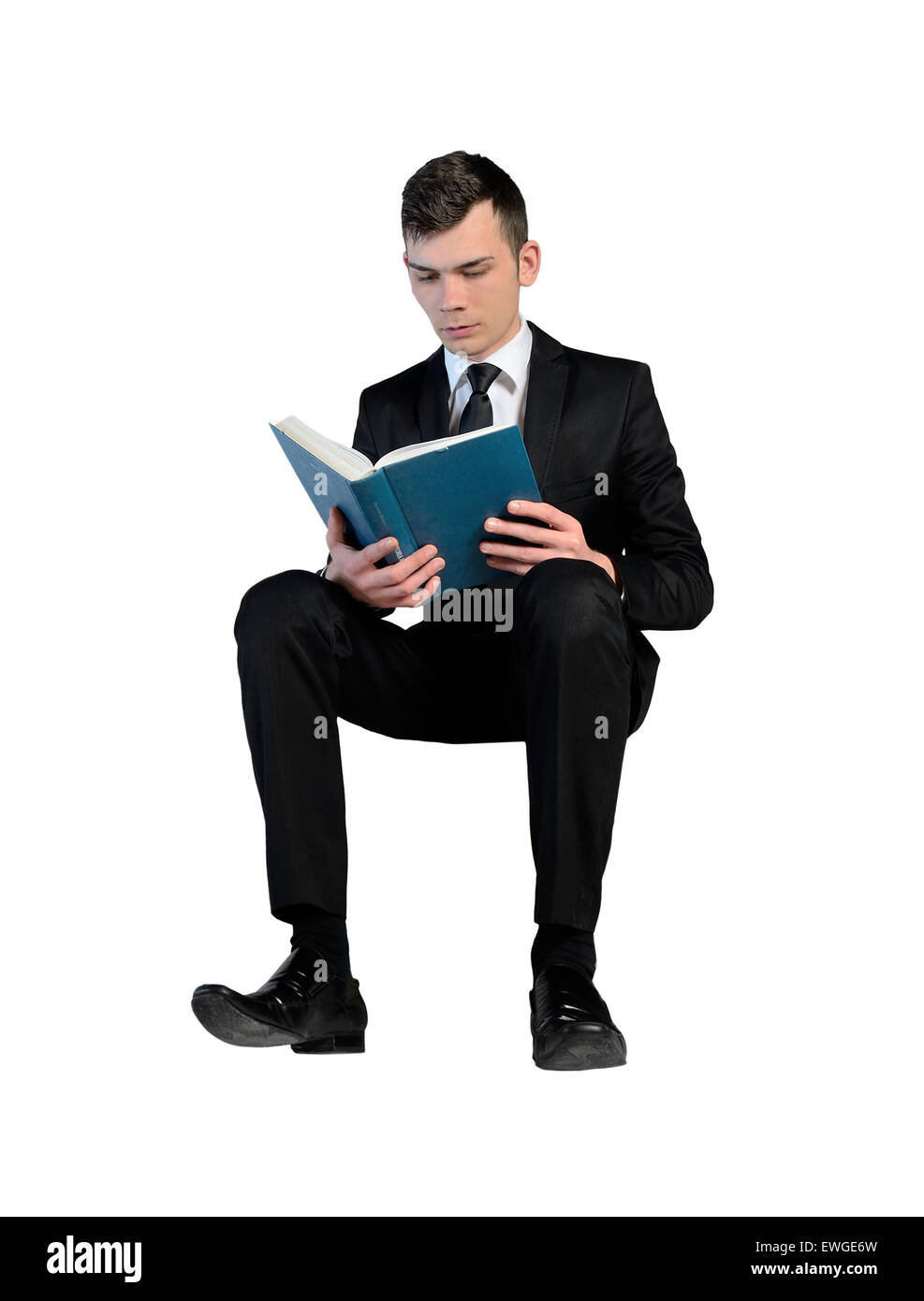 Isolated business man reading book Stock Photo - Alamy