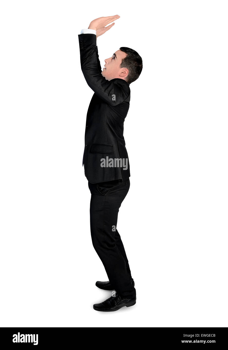 Isolated business man lifting something Stock Photo - Alamy