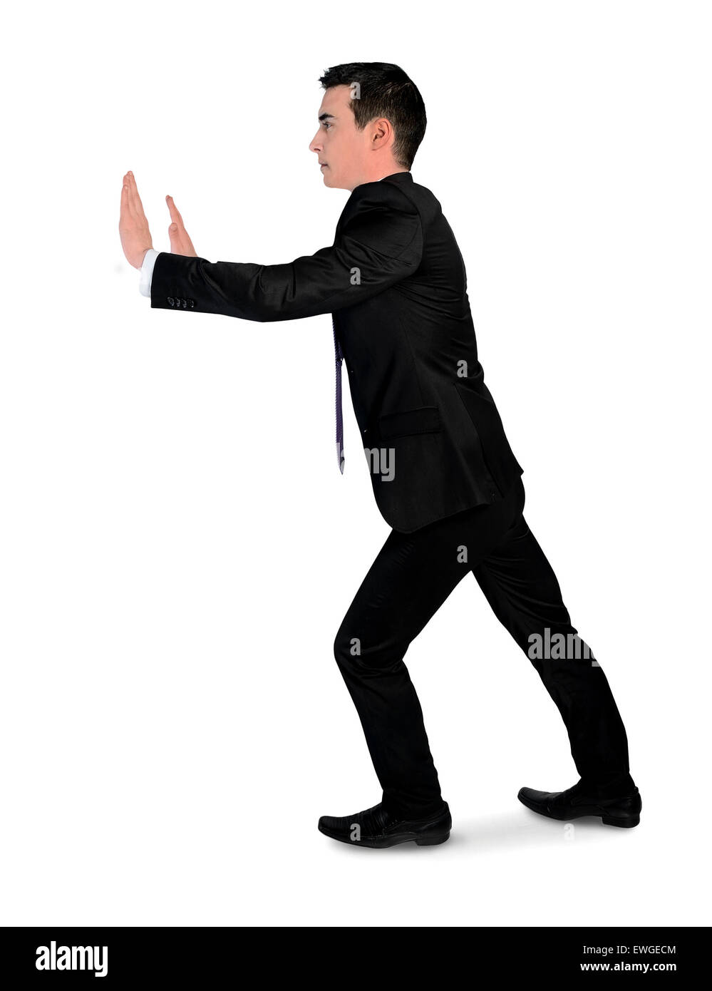 Isolated business man push something Stock Photo - Alamy