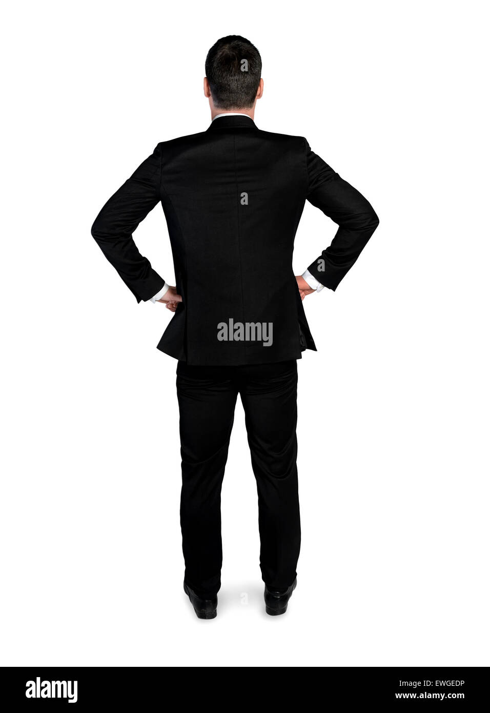 Isolated business man looking back Stock Photo - Alamy