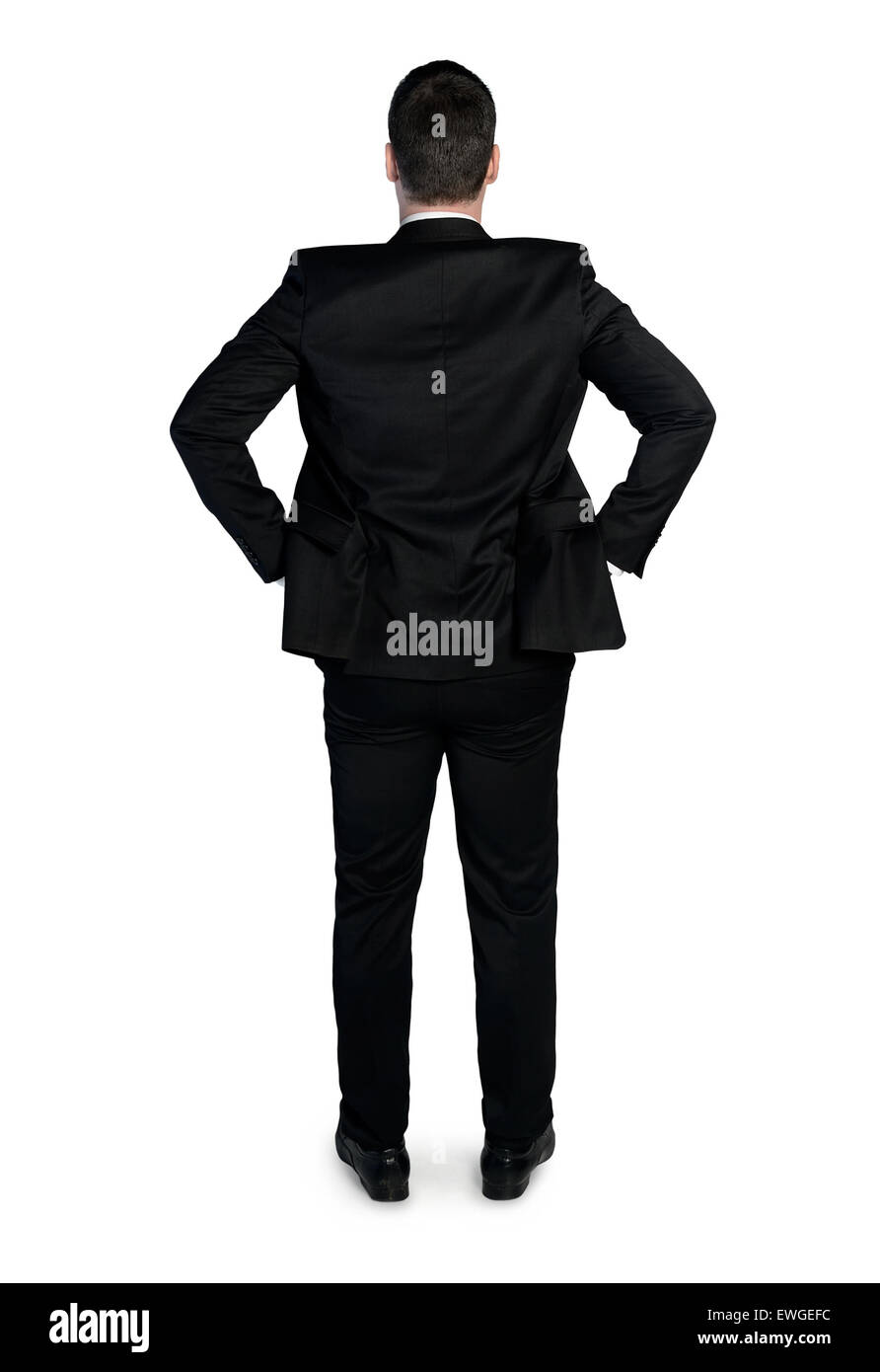 Isolated business man looking back Stock Photo - Alamy