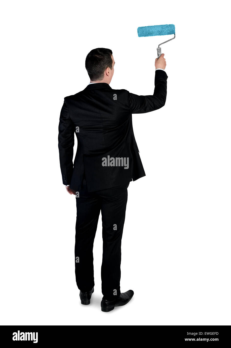 Isolated business man with paint roller Stock Photo - Alamy