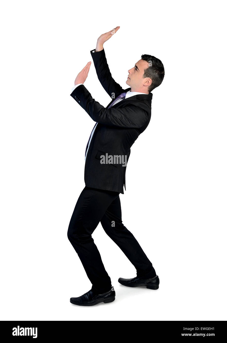 Isolated business man push something Stock Photo - Alamy