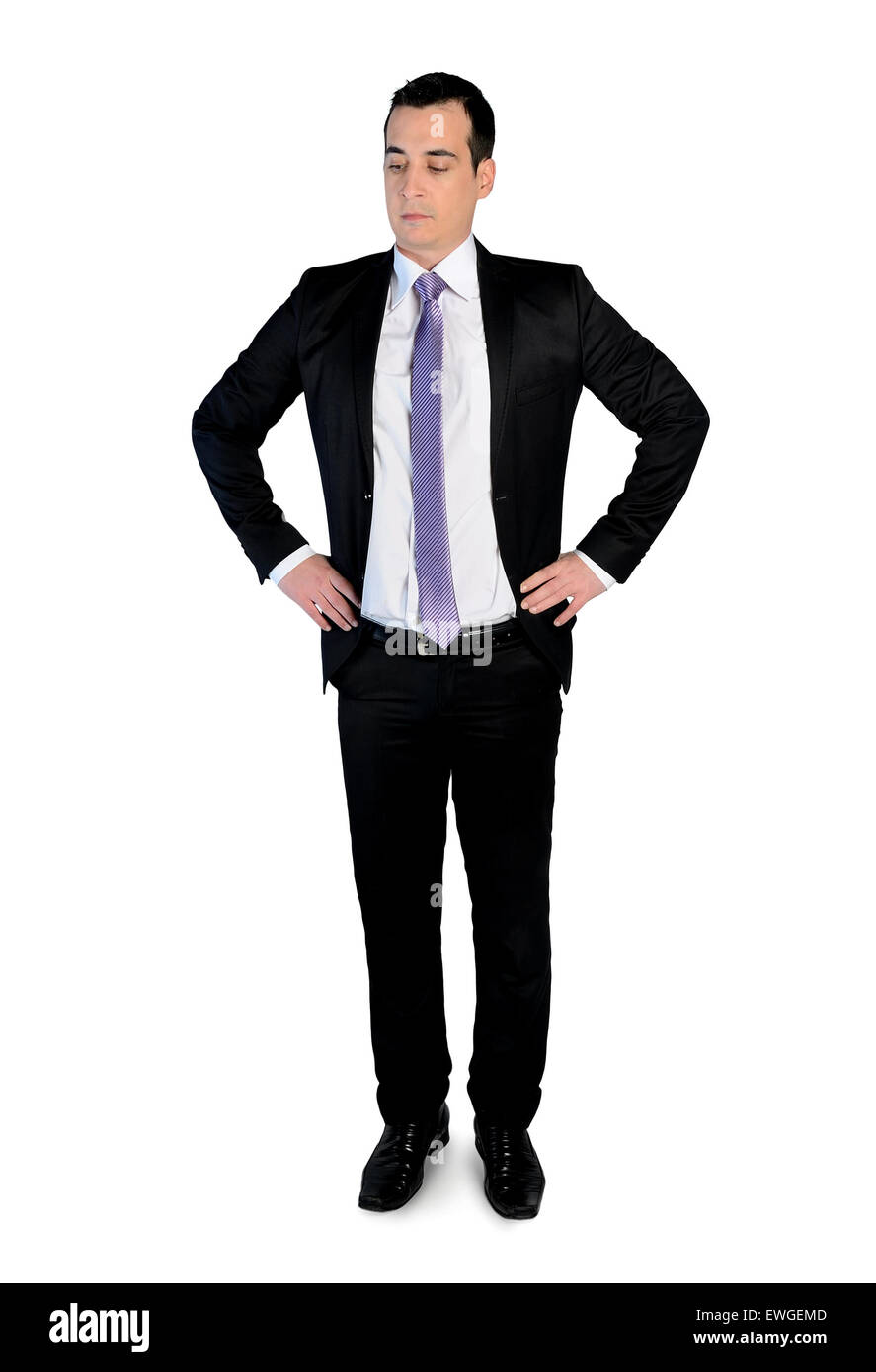 Isolated business man looking down Stock Photo - Alamy