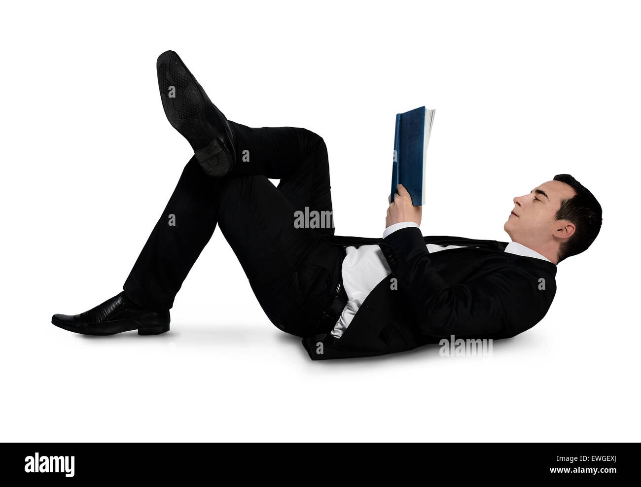 Reading relaxing young man Cut Out Stock Images & Pictures - Alamy