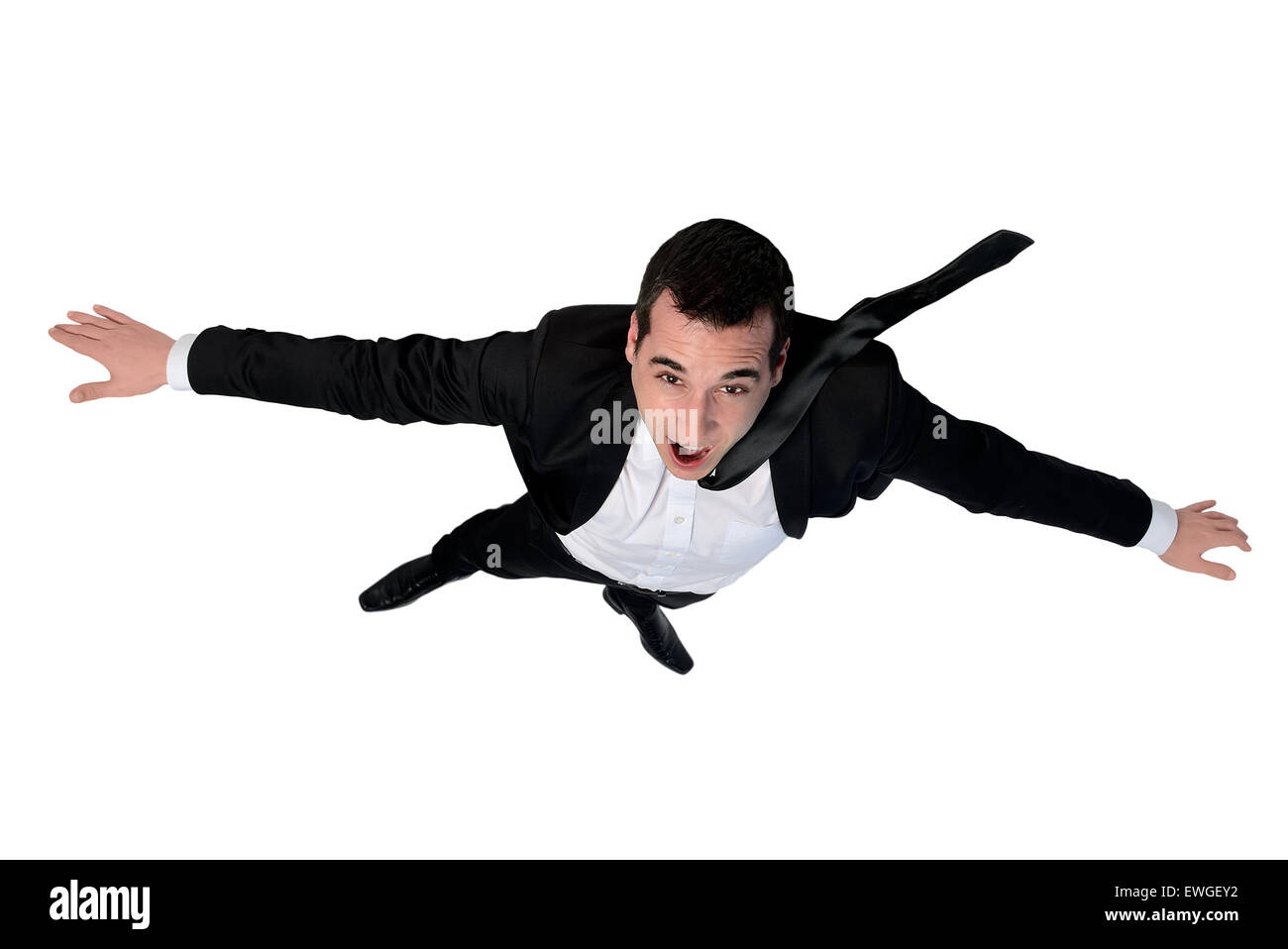 Isolated business man fly position Stock Photo - Alamy