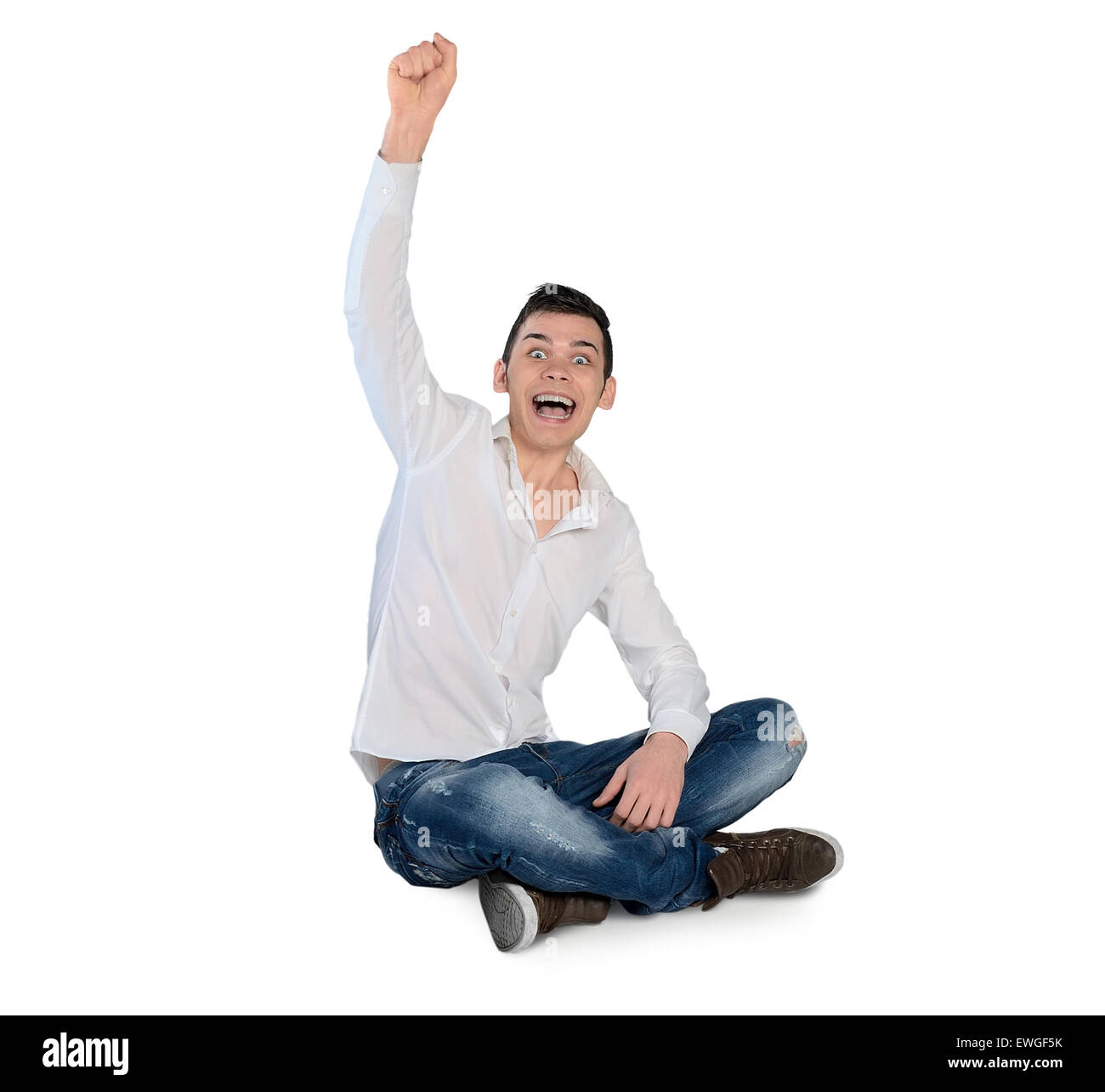 Isolated young man winner hand up Stock Photo - Alamy