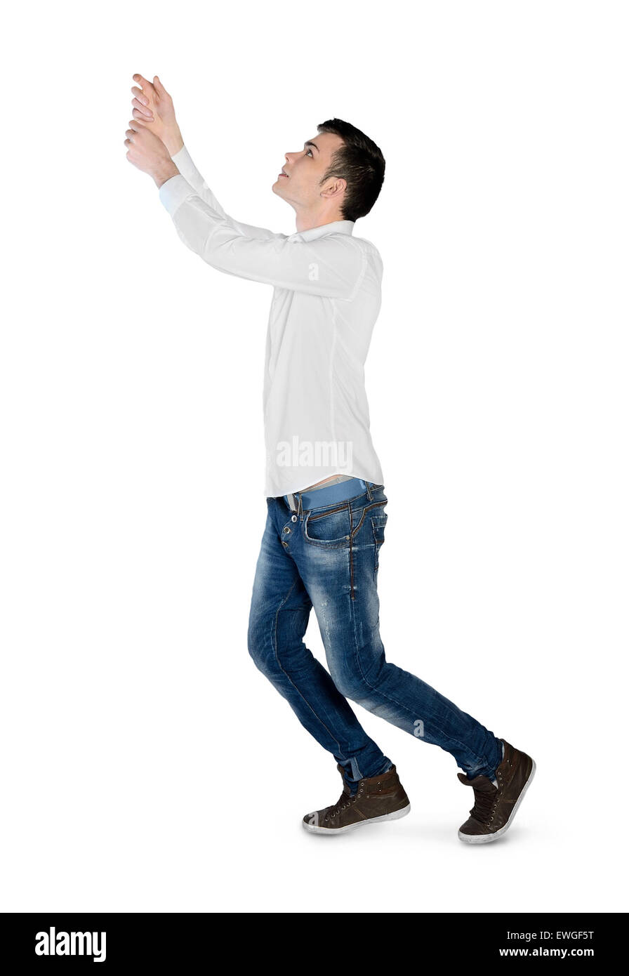 Isolated young man drag something Stock Photo - Alamy