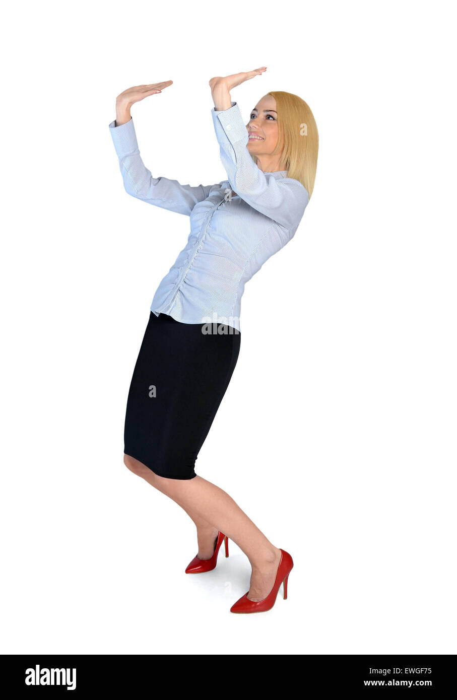 Isolated business woman lifting something Stock Photo - Alamy