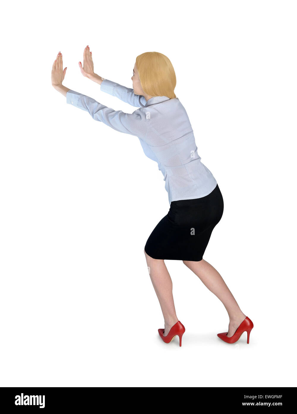 Isolated business woman pushing something Stock Photo - Alamy