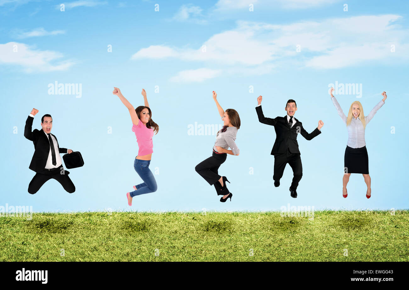 Happy five people jumping in landscape Stock Photo - Alamy