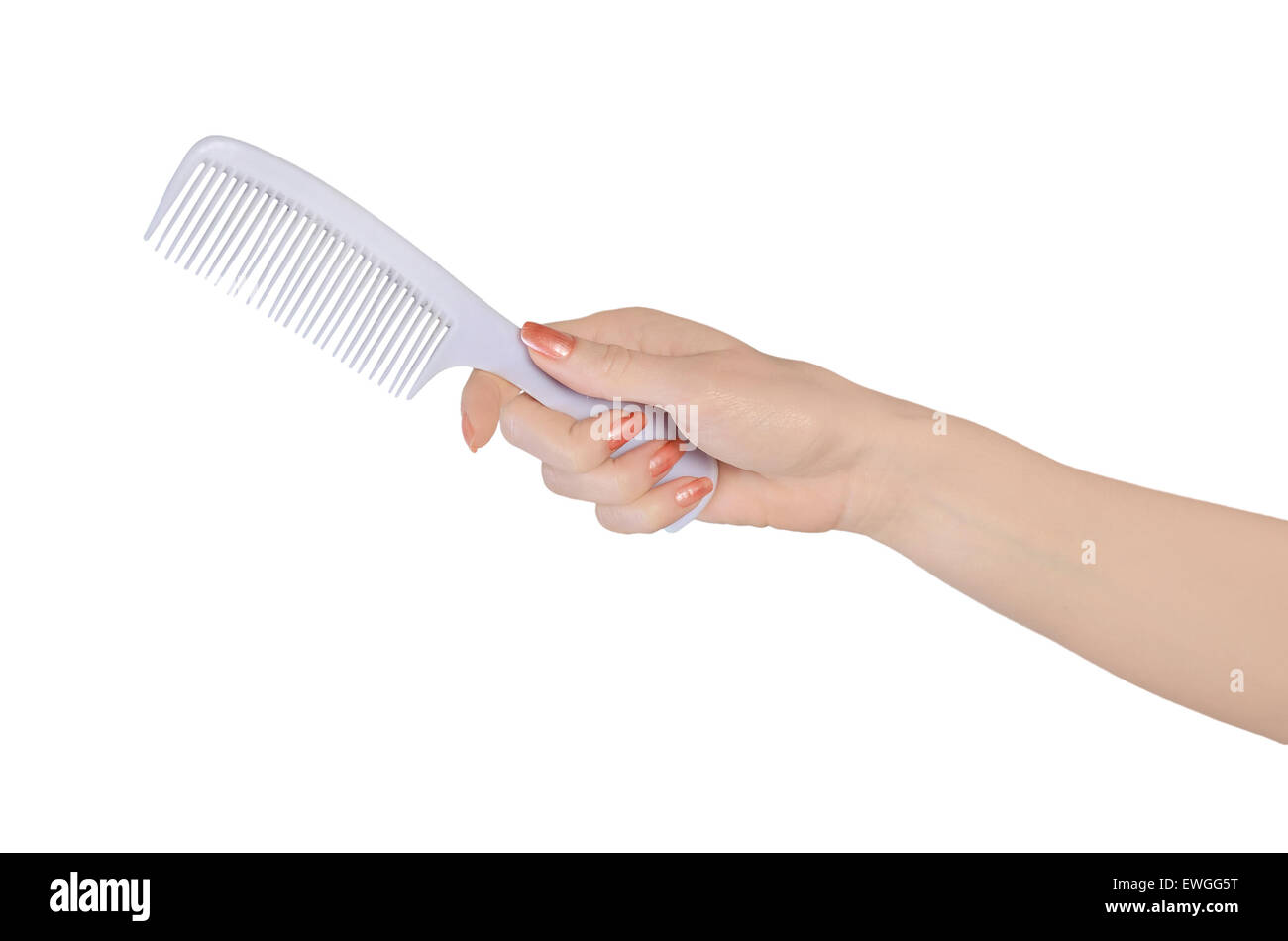 Arm holding comb hi-res stock photography and images - Alamy