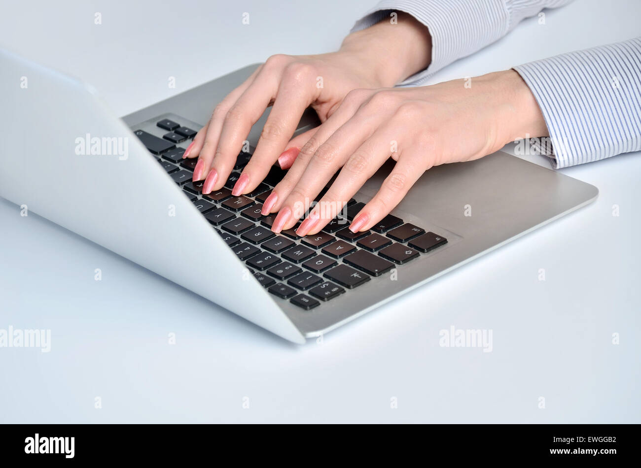 Business woman hands typing laptop Stock Photo - Alamy