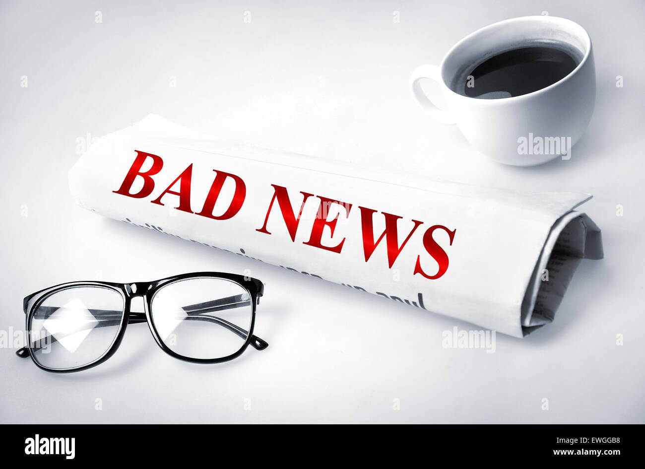 Bad news word on newspaper Stock Photo - Alamy
