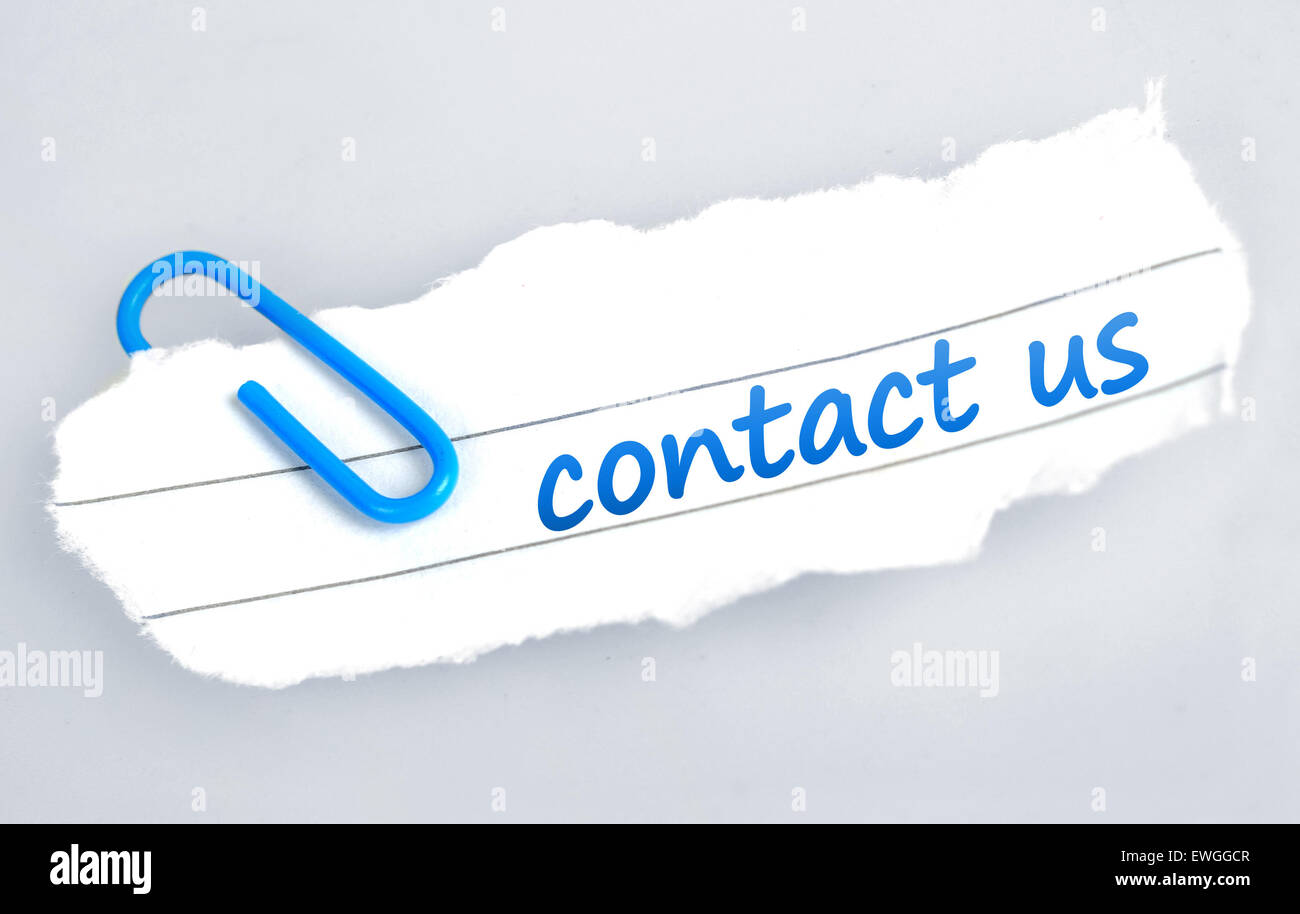 Contact us word on grey background Stock Photo - Alamy