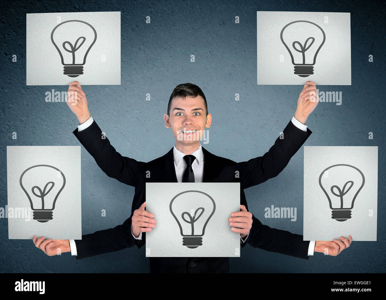 Business man with many ideas Stock Photo - Alamy