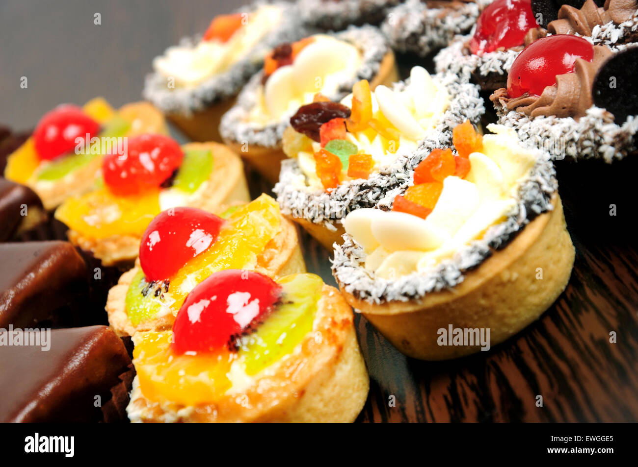 Many cakes on table Stock Photo - Alamy