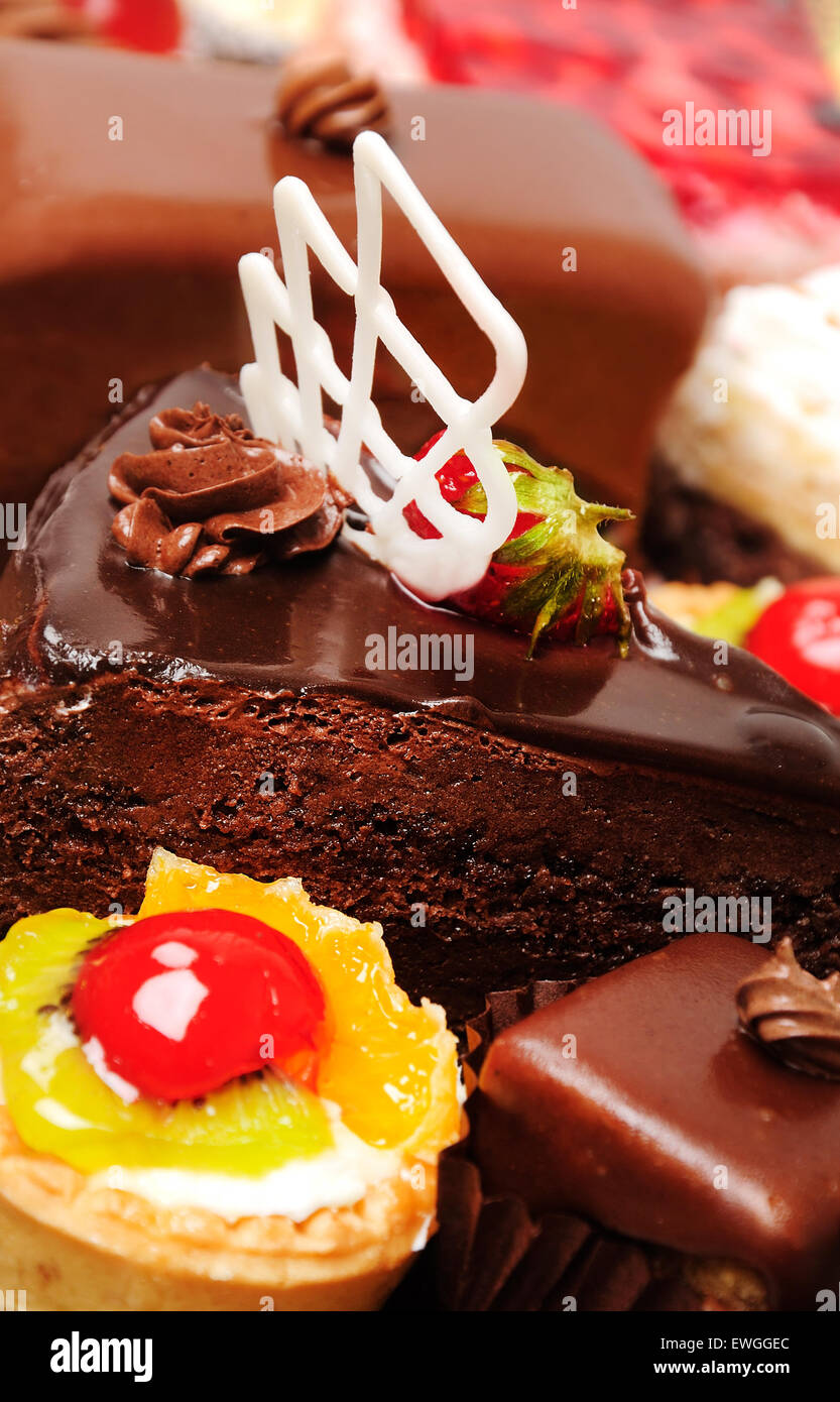Many cakes with fruits and chocolate Stock Photo - Alamy
