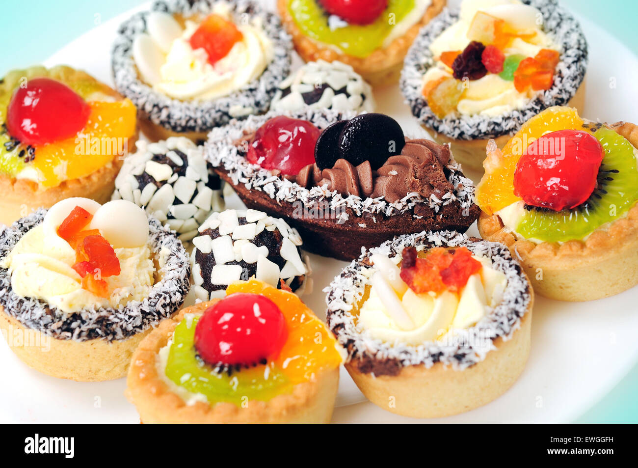 Many cakes on blue background Stock Photo - Alamy