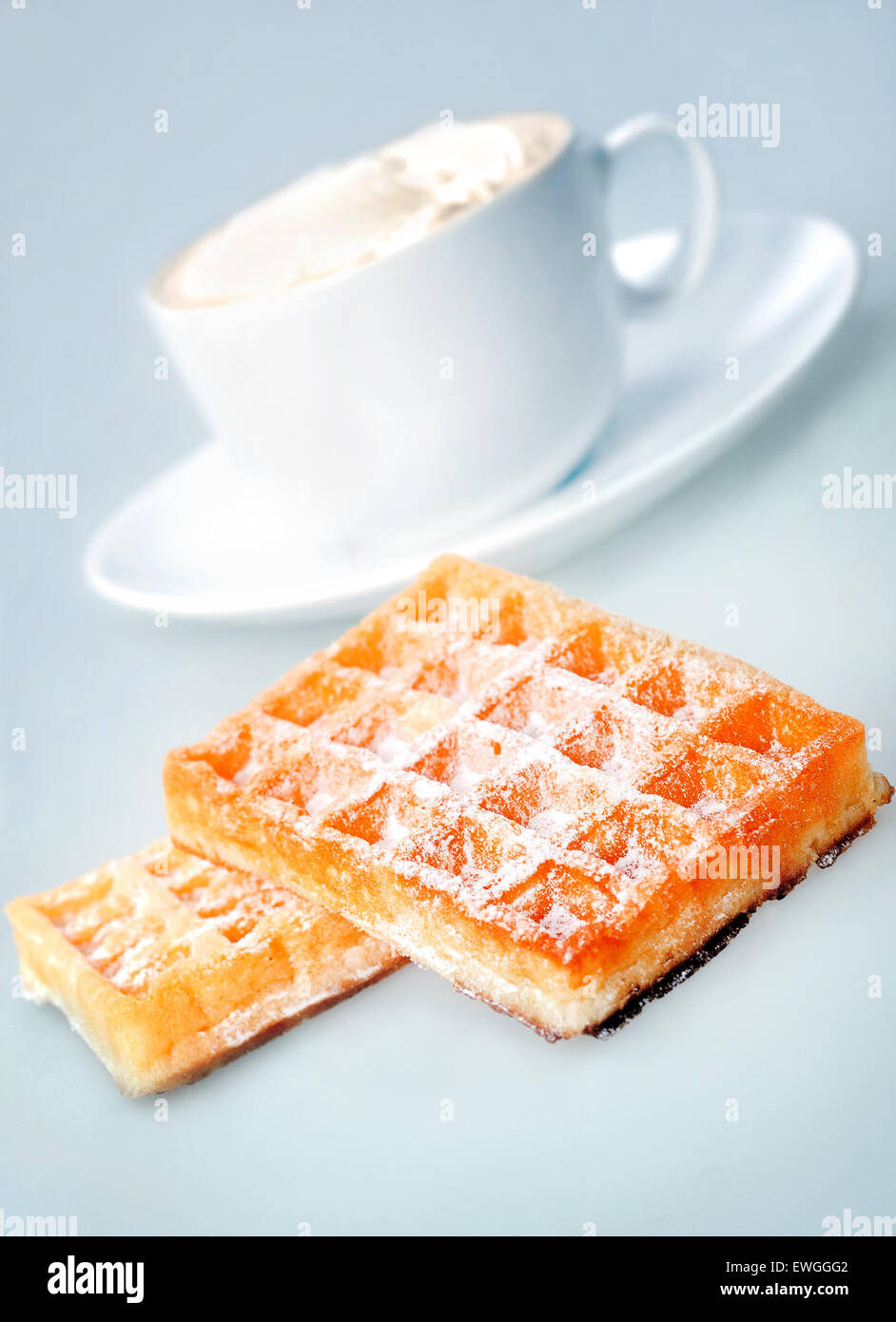 waffle on blue background Stock Photo - Alamy