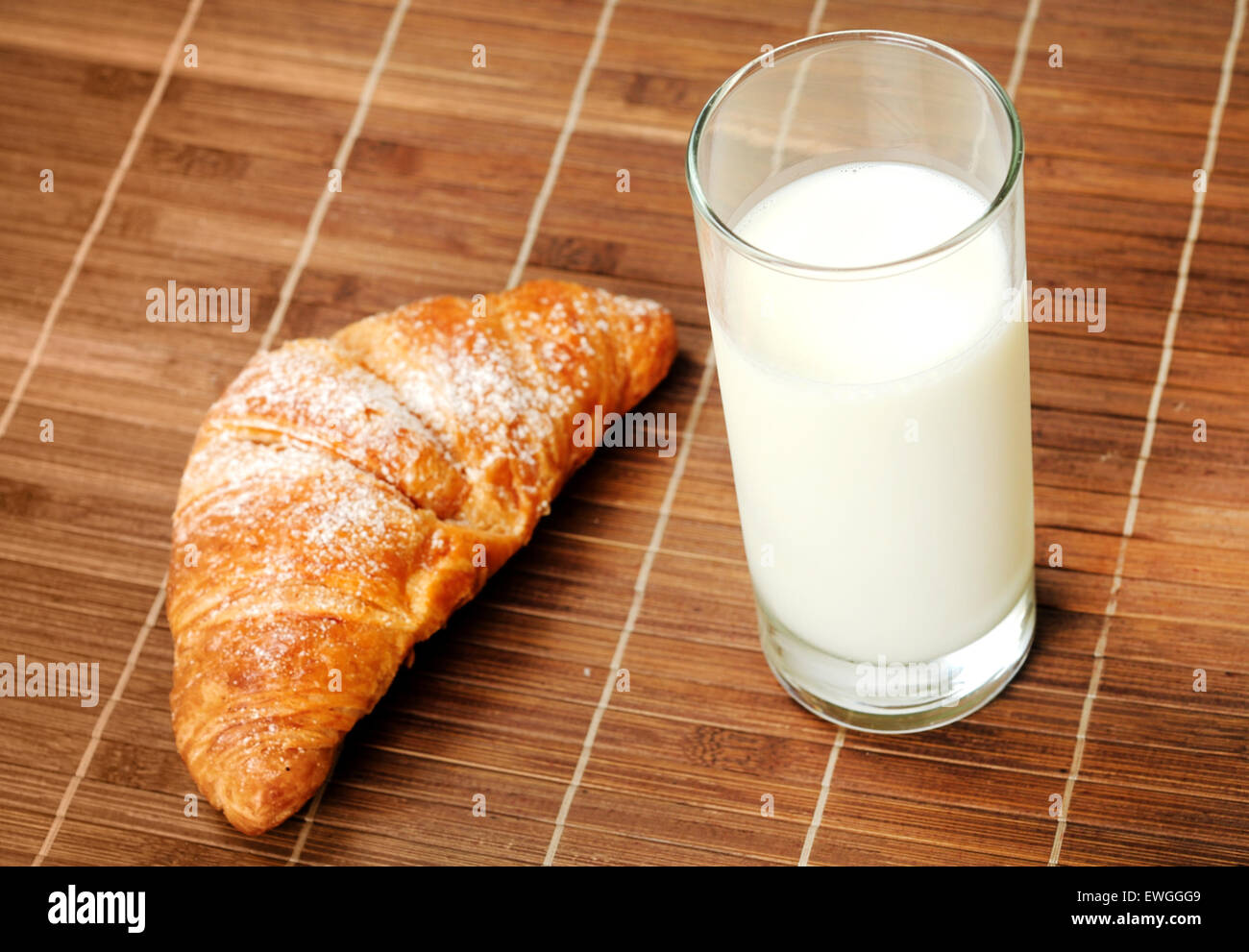 glass with milk on table Stock Photo - Alamy