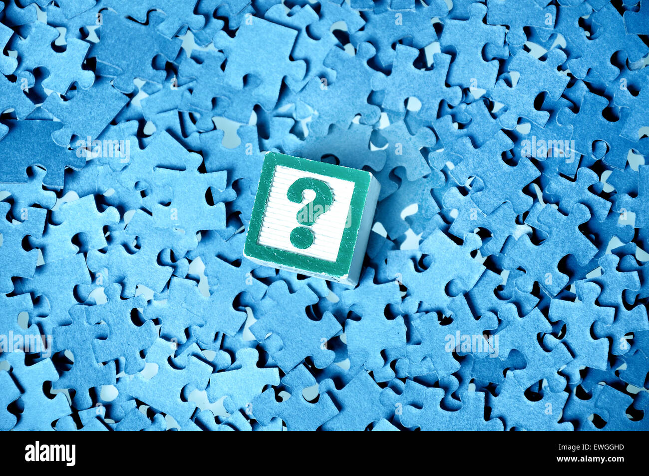 Question mark on a puzzle background Stock Photo - Alamy