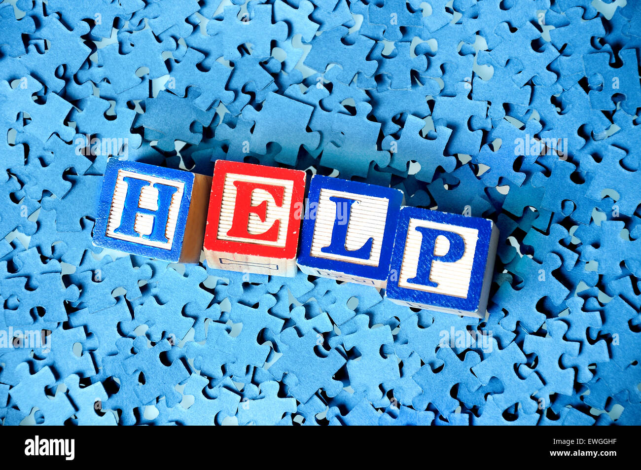 Help word on a puzzle background Stock Photo - Alamy