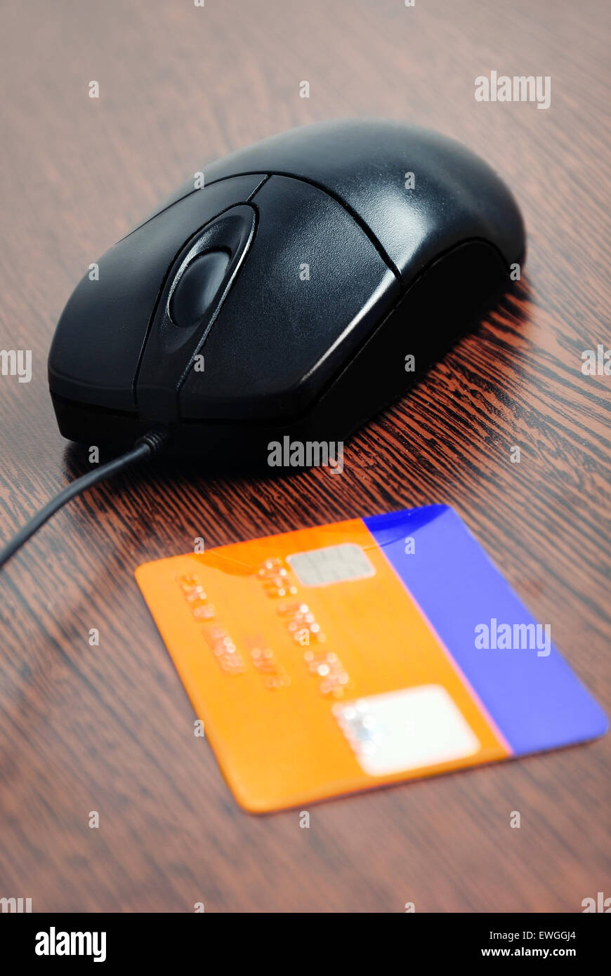 Mouse and card payment on table Stock Photo - Alamy