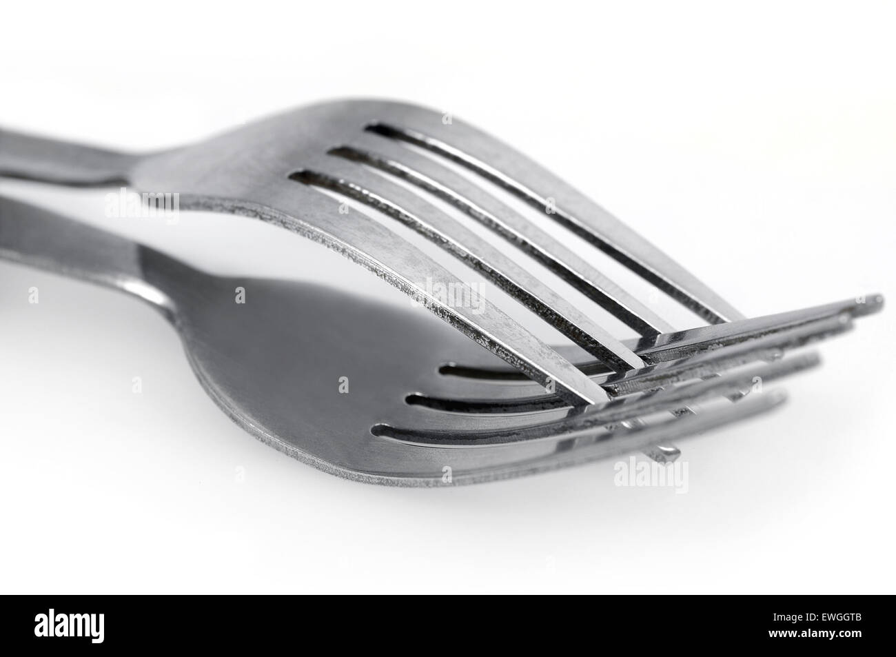 Isolated two forks on white background Stock Photo - Alamy