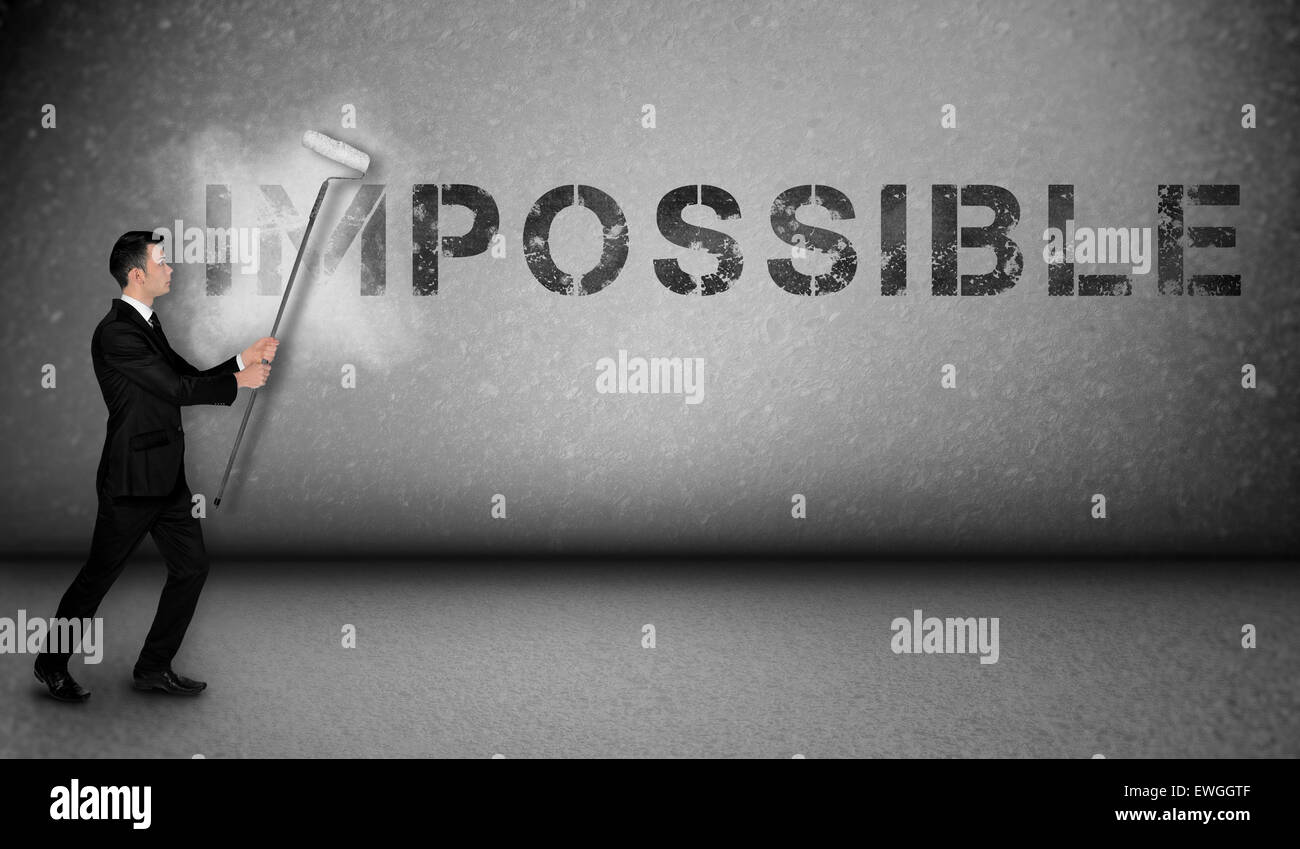 Impossible word painting on gray wall Stock Photo - Alamy