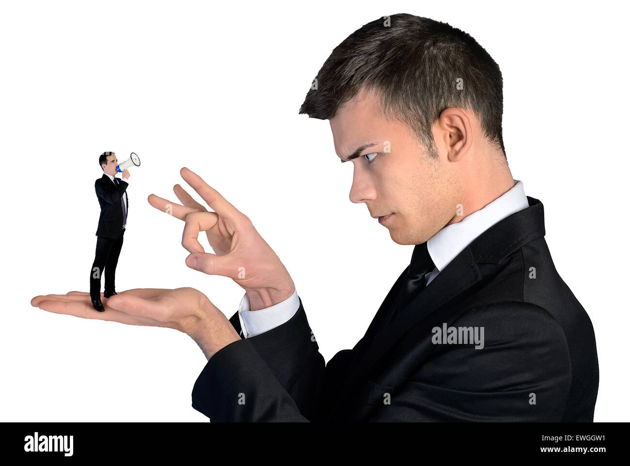 Isolated business man finger flipping on little man Stock Photo - Alamy