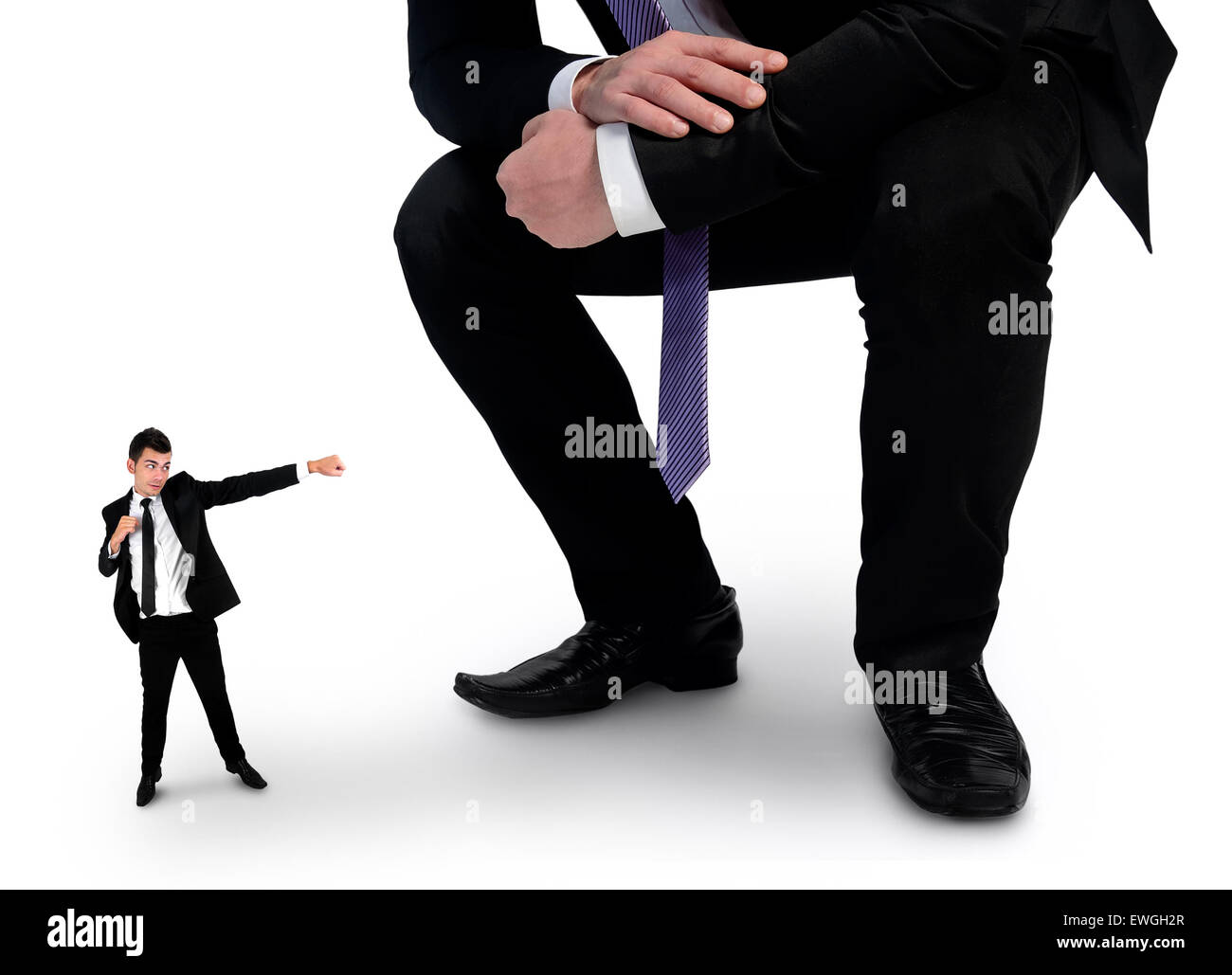 Isolated little business man fighting with boss Stock Photo - Alamy