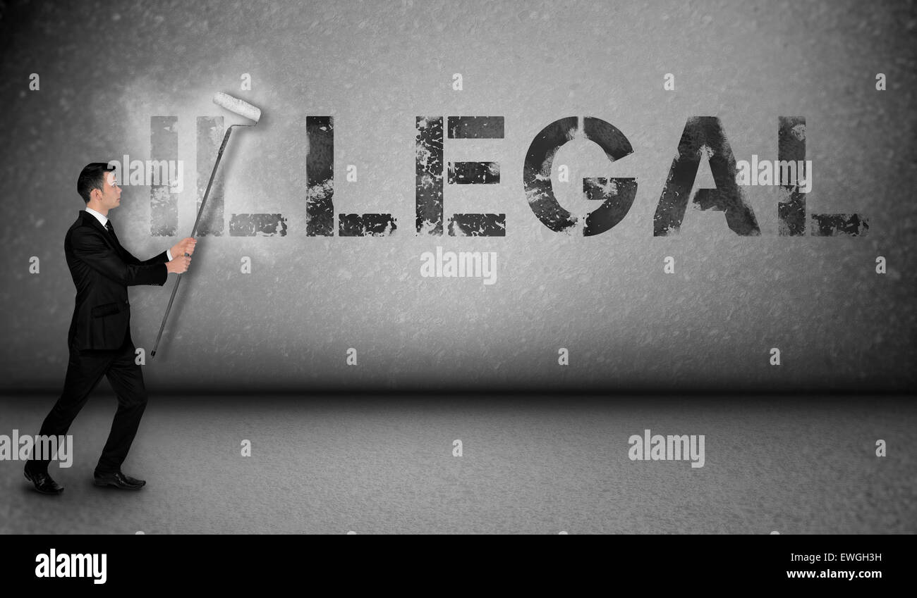 Illegal word painting on gray wall Stock Photo - Alamy