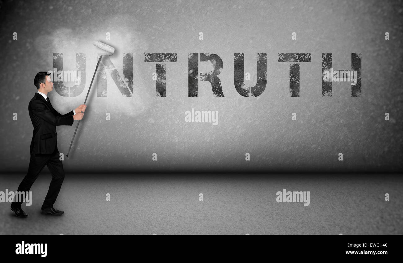 Untruth word painting on gray wall Stock Photo - Alamy