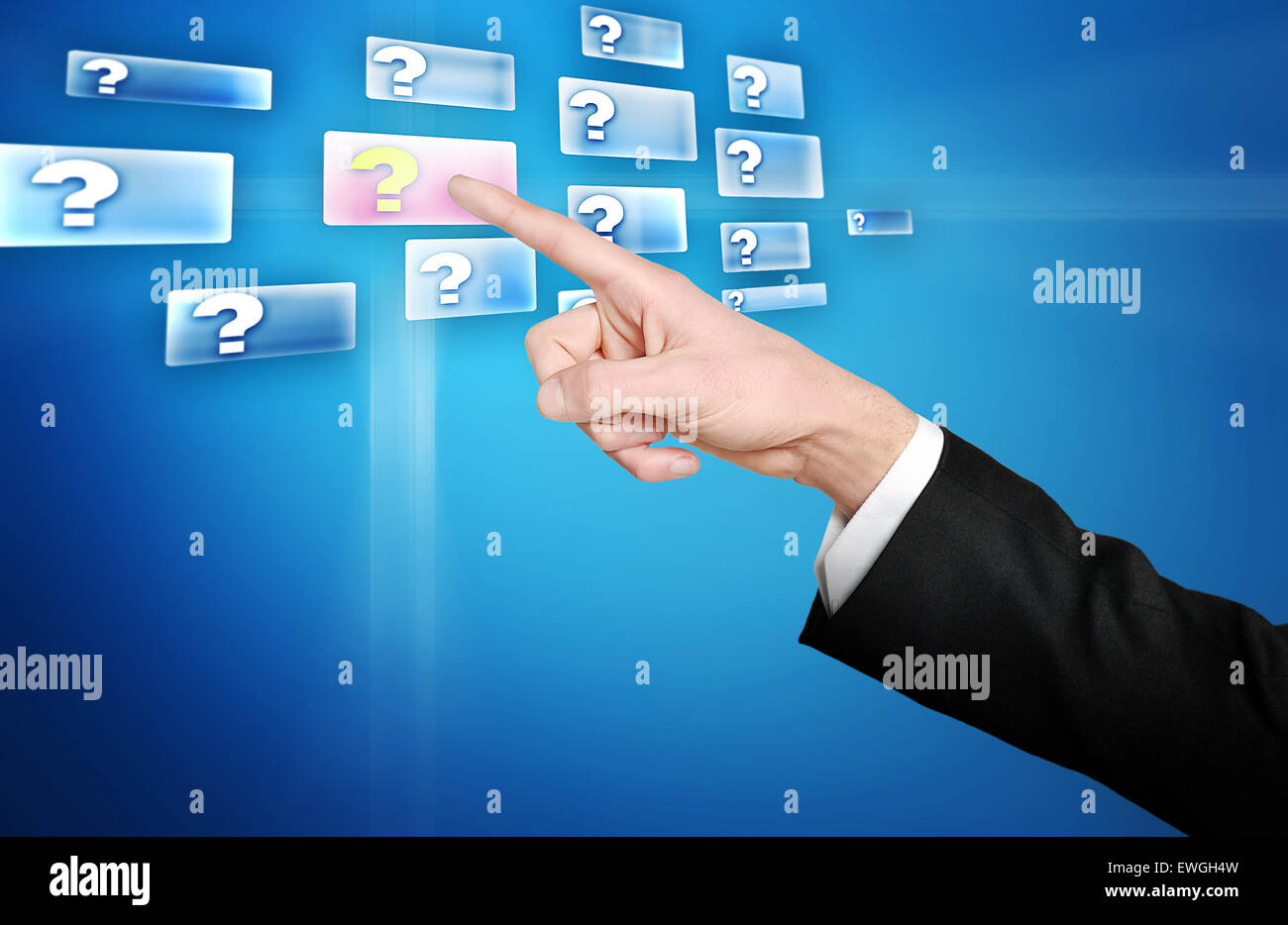 Question mark buttons pressed by hand Stock Photo - Alamy